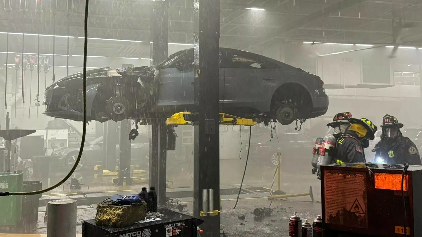 Audi e-Tron GT Catches Fire On The Lift Inside Dealership | Audiworld