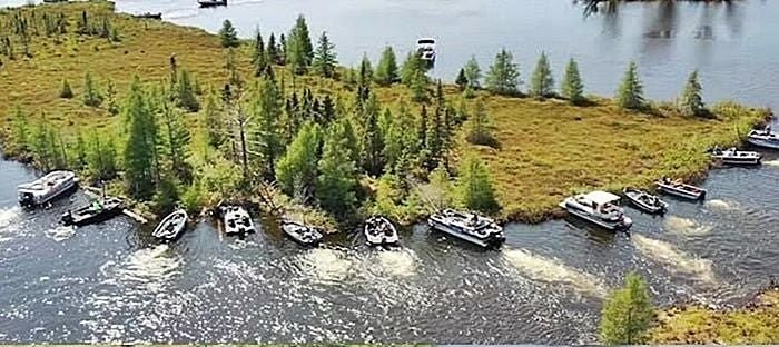 boats pushing an island