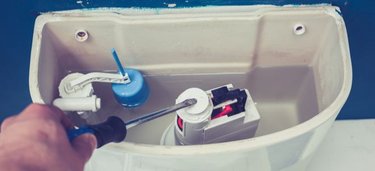 How to Adjust a Toilet Float | DoItYourself.com
