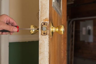 How to Repair a Loose Doorknob | DoItYourself.com