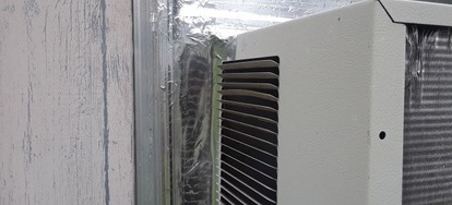 How to Seal Space Around an Air Conditioner Unit | DoItYourself.com