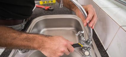 Repairing a Faucet: How to Fix a Loose Handle | DoItYourself.com