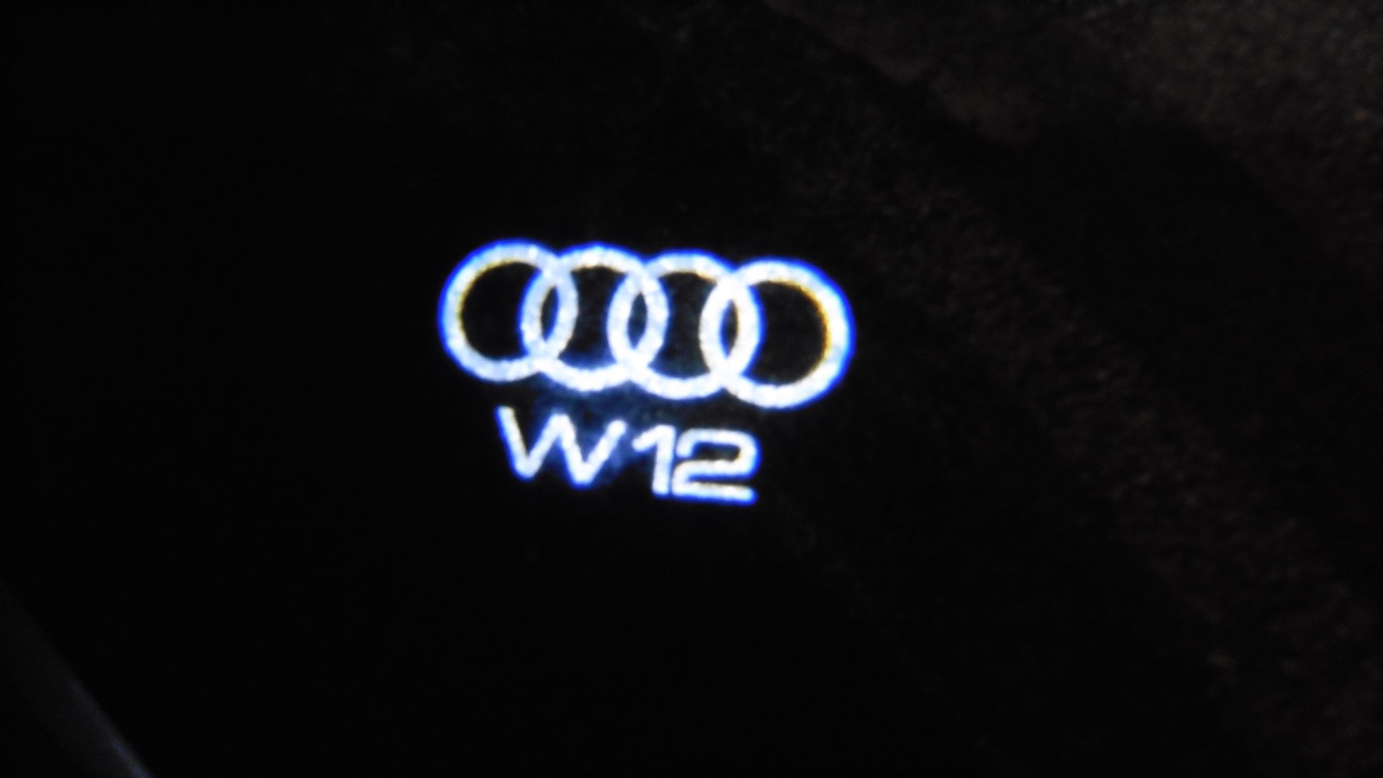 going to put logo projectors under your doors ? - AudiWorld Forums