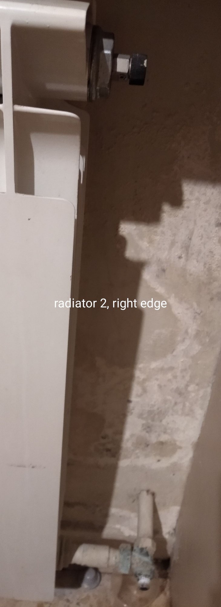 Radiator in apt not heating, pipe to it is hot; Round thing in photo ...