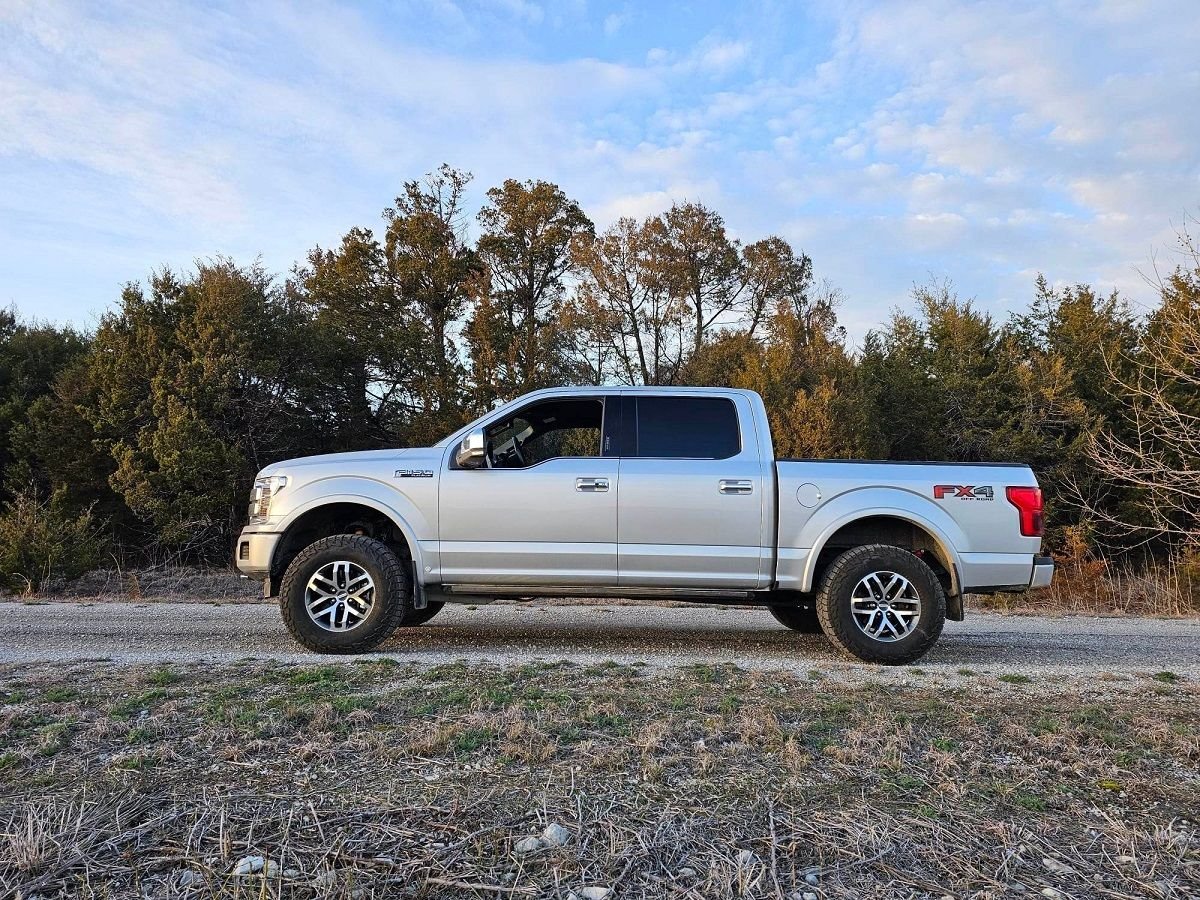 Wanting to lift the rear 2 inches - Add a leaf or replacement leaf pack ...