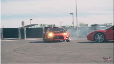 Ferrari-powered Toyota 86 does donuts around Ferrari 458
