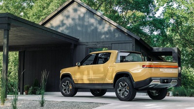 First production Rivian R1T silently rolls off assembly line, customer ...