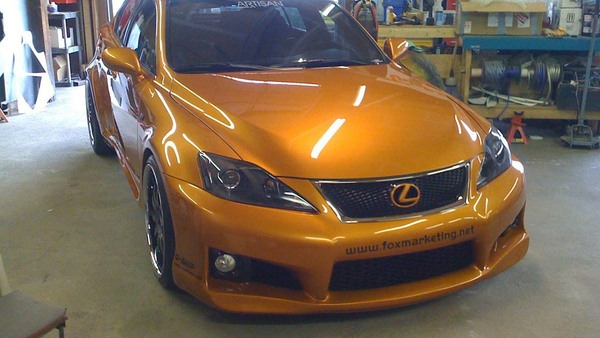 Artisan preparing turbocharged IS-F for SEMA